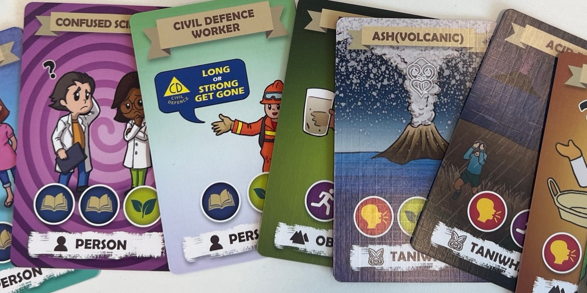 Eruption of fun: Card game challenges students to team up to tackle ...
